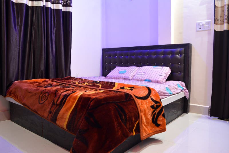 Simple Bedroom with Comfortable Soft Bed. Stock Photo - Image of room ...