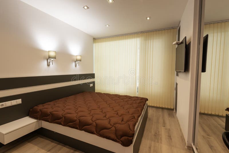 Simple Bedroom Interior with Large Comfortable Bed. Interior ...