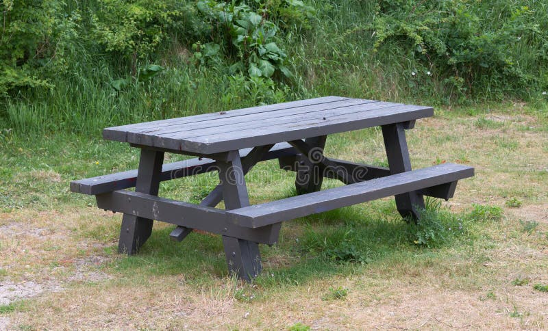 Simple bench in a park stock image. Image of colorful - 129019169