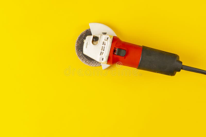 A Simple Black and Red Angle Grinder Machine Tool Isolated Against the ...