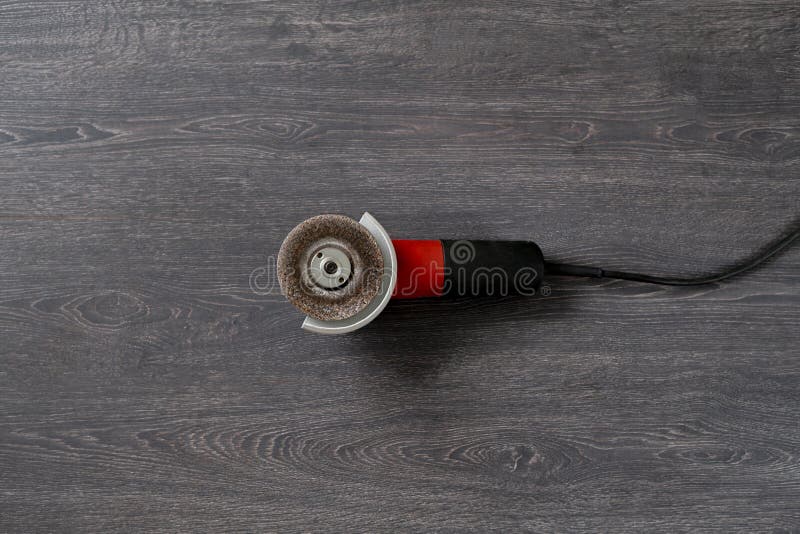 A Simple Black and Red Angle Grinder Machine Tool Isolated Against the ...
