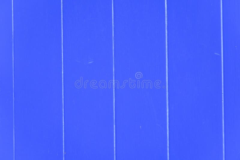 A Simple Blue Paneled Wall with Vertical Lines Creates a Clean ...