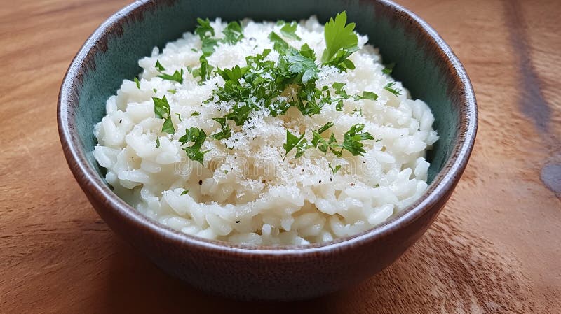A Simple Bowl of Risotto with a Sprinkle of Parmesan and Fresh Parsley ...