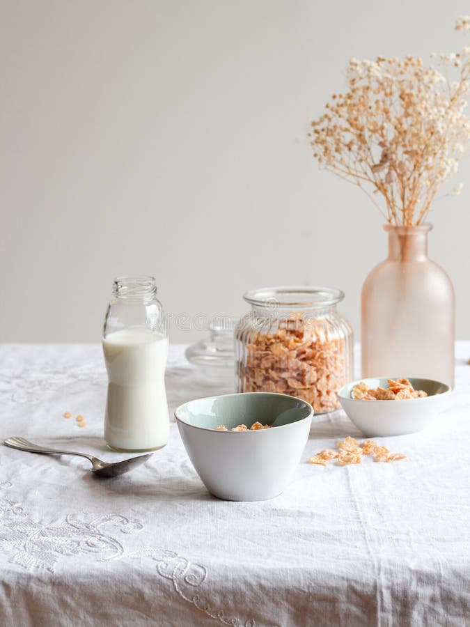 A Simple Breakfast Table with Milk and Cornflakes Stock Photo - Image ...