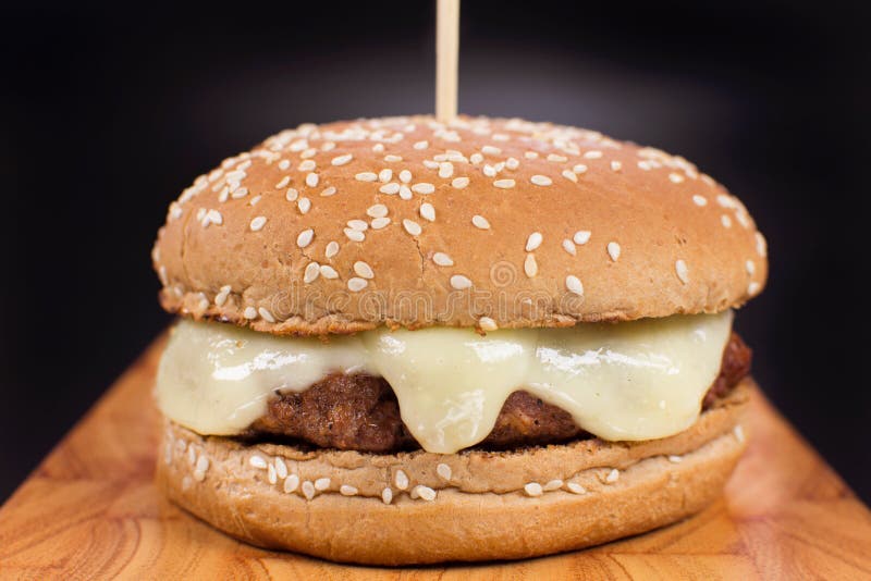 Simple Burger in a Wood Table Stock Image - Image of burger, fresh ...