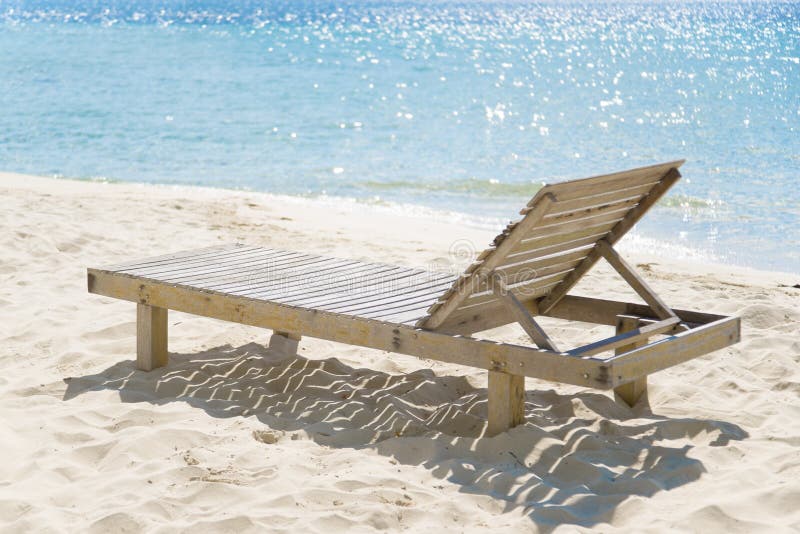 Simple Chair at Beach with Bokeh Background Stock Image - Image of ...