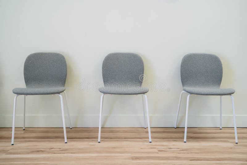 Simple chairs in a room stock photo. Image of empty - 376500122