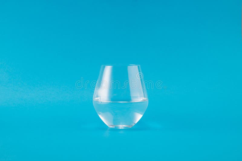 A Simple and Clean Image Featuring a Half-filled Glass of Water Stock ...