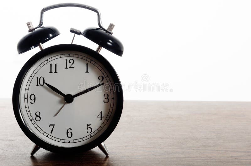 A Simple Clock Against White Stock Image - Image of metallic, alarm ...