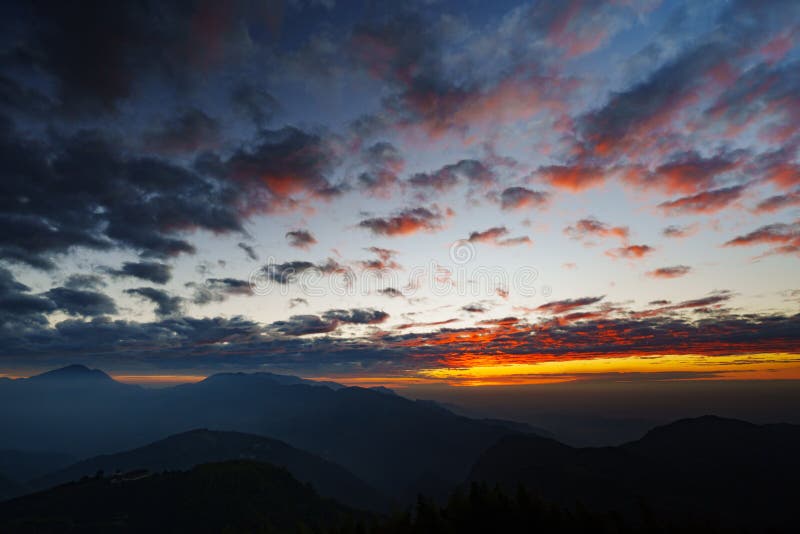 The Residual Light from Sunset Warm Up the Sky and Mountains Stock ...