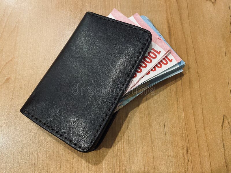 Simple Leather Wallet and Some Money, Rupiah Money from Indonesia Stock ...