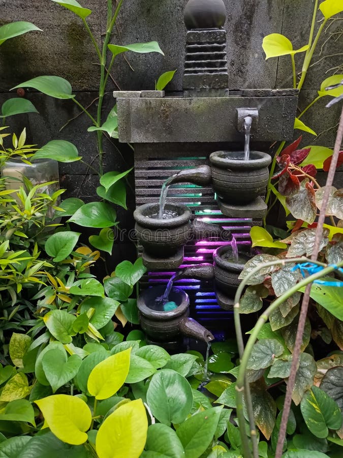 Simple Design of Small Water Fountain for Home Stock Photo - Image of ...