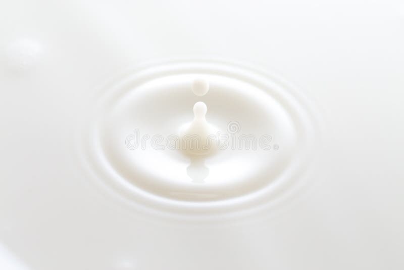 Simple Drop of Milk into a Bowl of Milk Stock Image - Image of cream ...