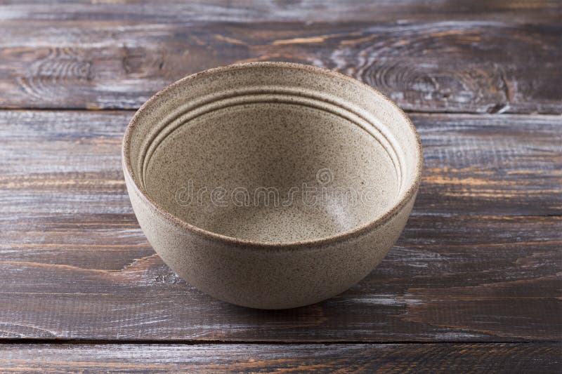 Simple Empty Beige Craft Ceramic Bowl on Wooden Table, Rustic Style ...