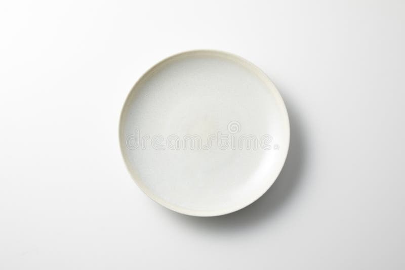 Simple and empty plate stock photo. Image of flowers - 201229108