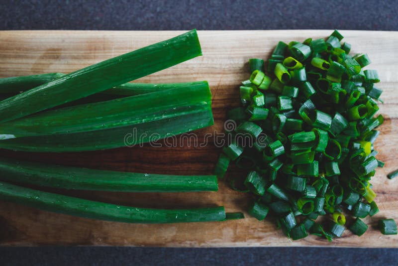 Simple Food Ingredients, Fresh Spring Onion Getting Chopped on Cuttin ...