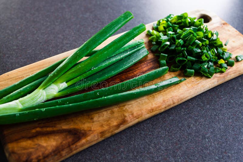 Simple Food Ingredients, Fresh Spring Onion Getting Chopped on Cuttin ...