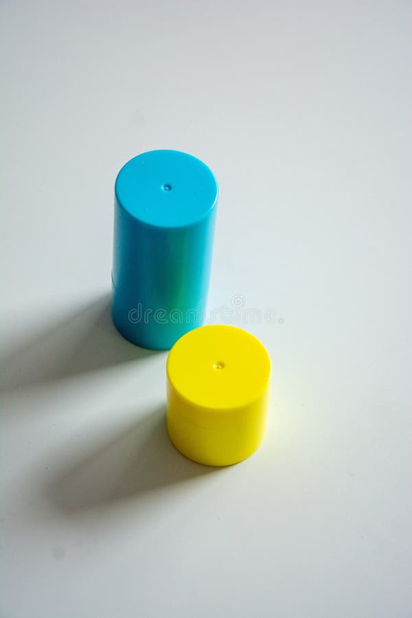 Simple Geometry: Blue and Yellow Cylinders Stock Photo - Image of ...