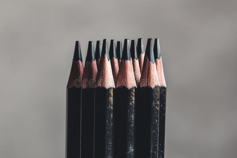 Simple Graphite Pencils on Grey Background. Black Pencils Stock Photo ...