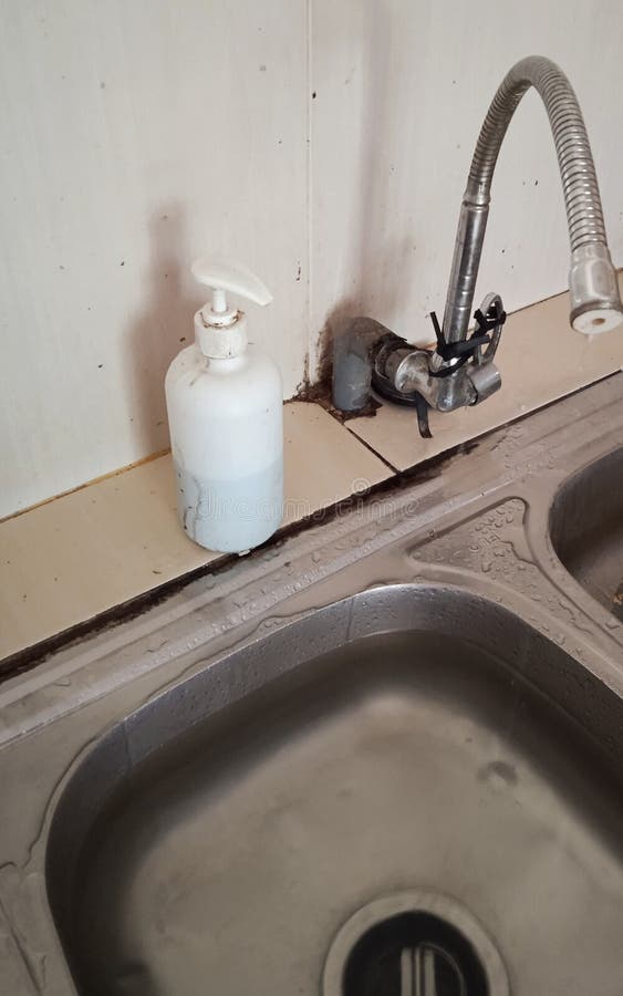 A Simple Hand Basin and Liquid Soap Stock Image - Image of wall ...