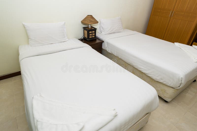 Row of simple hotel rooms stock image. Image of cement - 16044649