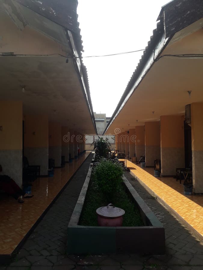 The Simple Hotel with a Long Yard in the Middle Stock Image - Image of ...