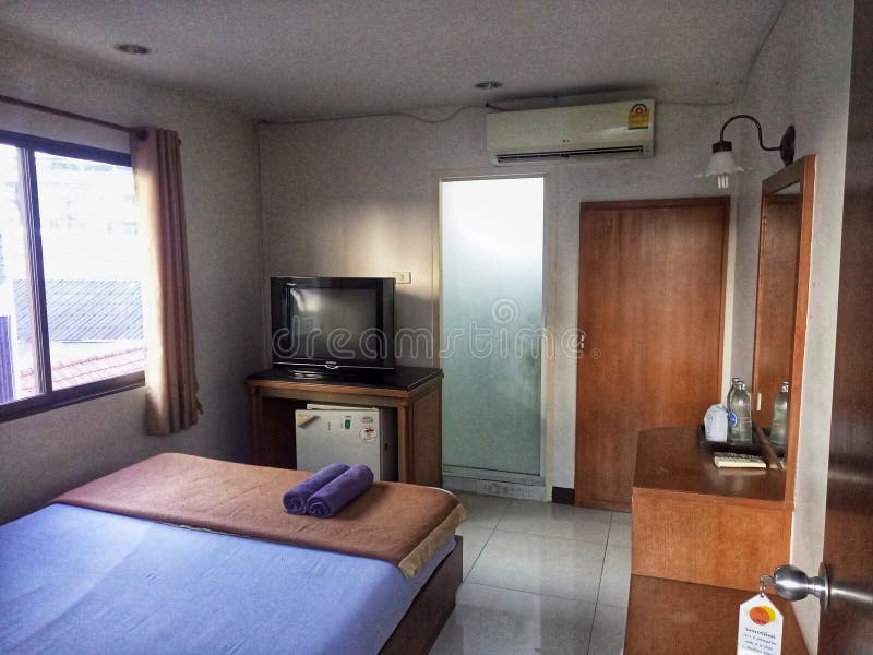 Simple Hotel room editorial photography. Image of elegance - 261303072