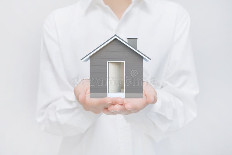 Simple House in Human Hands. Image Idea of Real Estate and Property ...