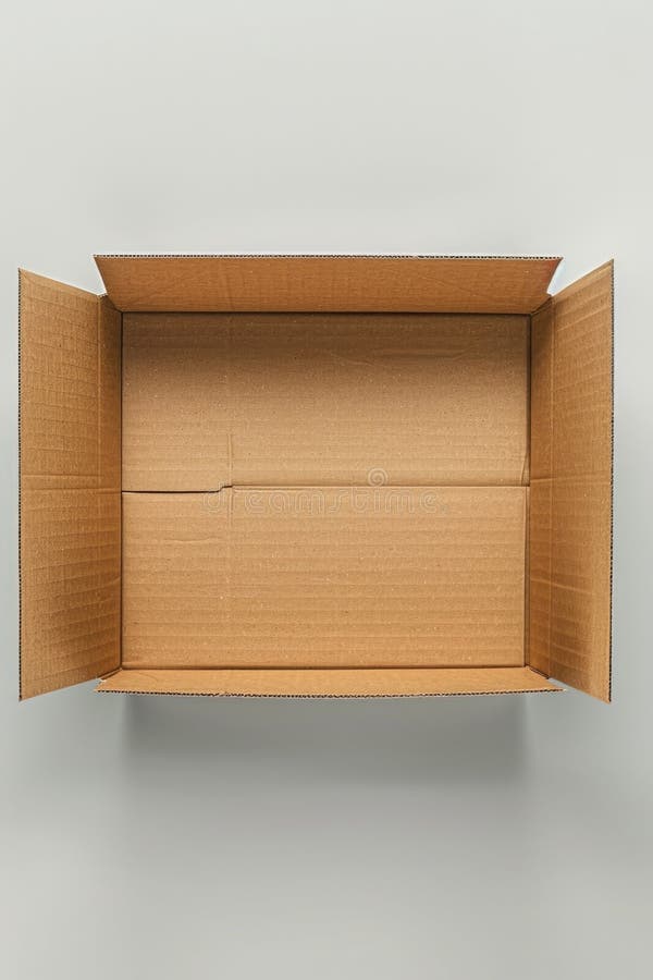 A Simple Image of an Open Cardboard Box on a Plain Surface. Perfect for ...