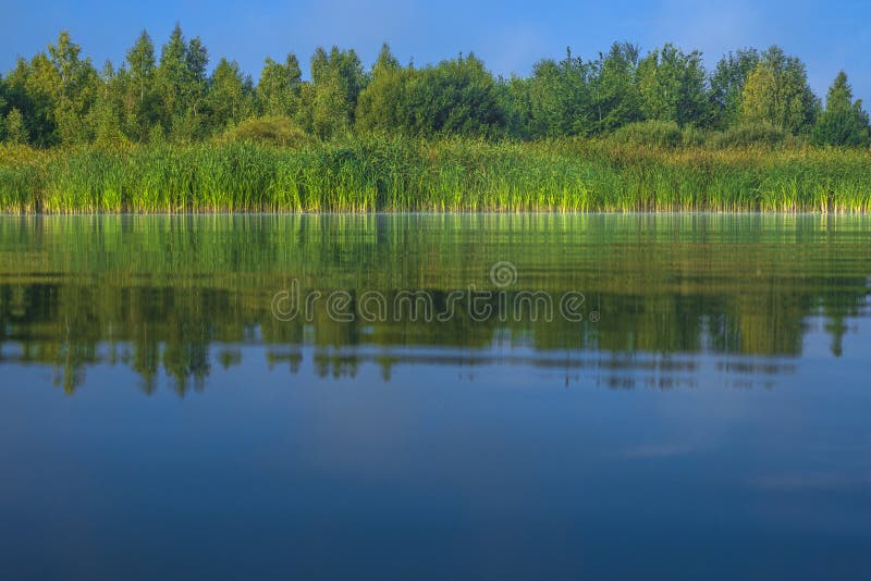 Simple Landscape of Lake with Shore Reflection Stock Image - Image of ...
