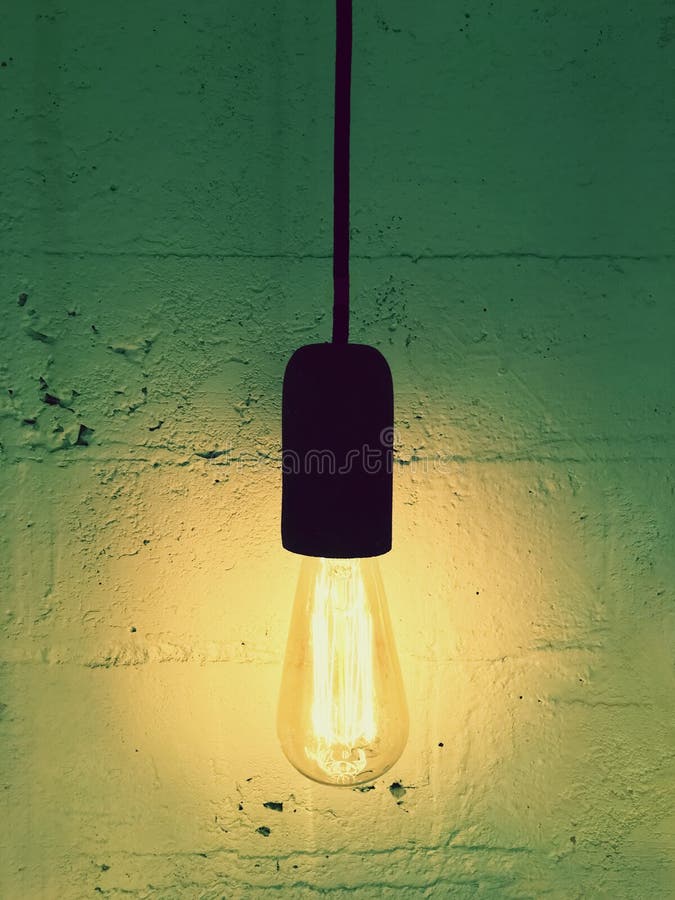 Simple Light Bulb on a Black Cord Stock Image - Image of black, lamp ...