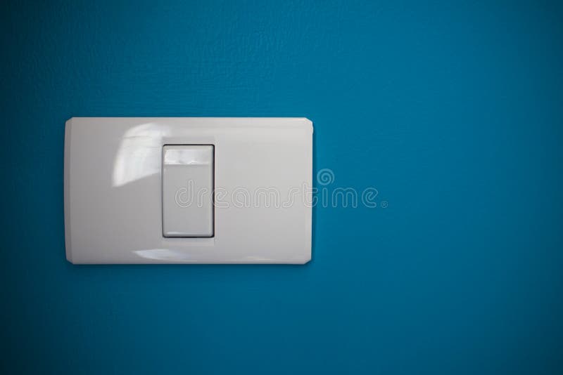 Simple Light Switch, White on a Blue Wall with Stock Photo - Image of ...