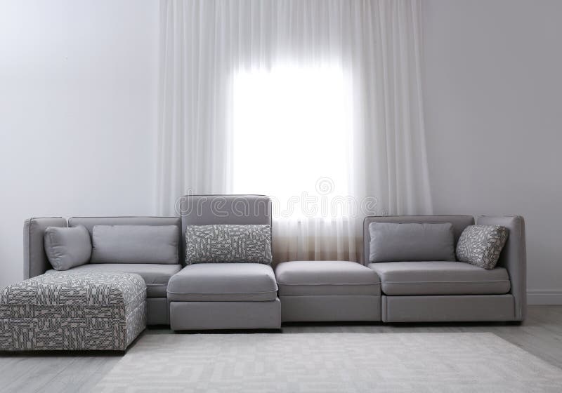 Simple Living Room Interior with Comfortable Sofa Stock Photo - Image ...