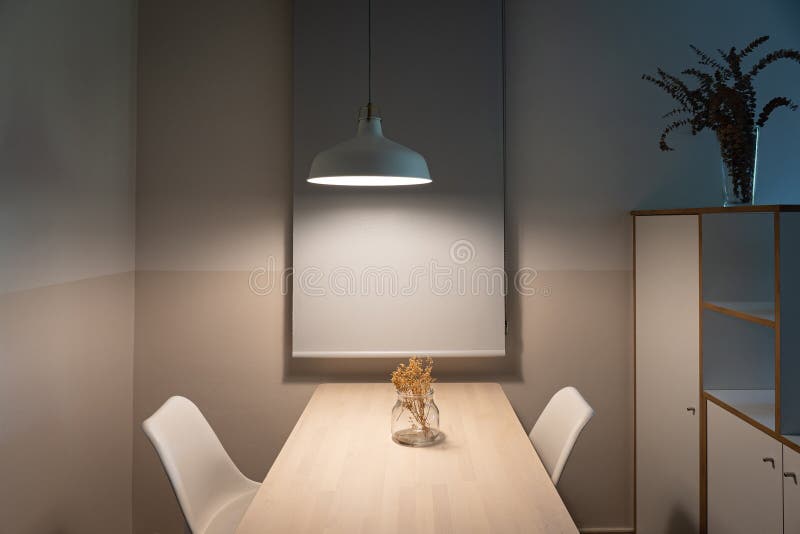 Simple and Minimalistic Dining Area with Two Chairs, Table and Lamp ...