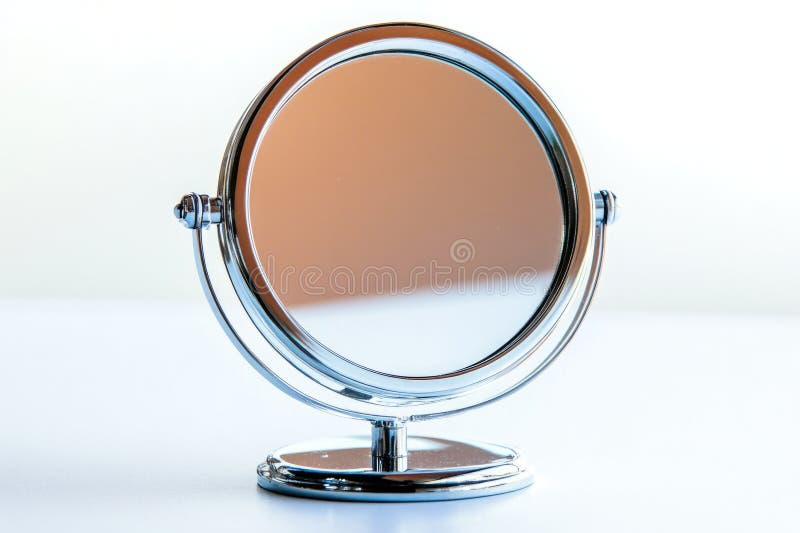 A Simple Mirror Sits on a Table, Ready for Use Stock Photo - Image of ...