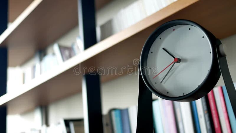 Simple Modern Clock on a Book Shelf . Stock Footage - Video of time ...