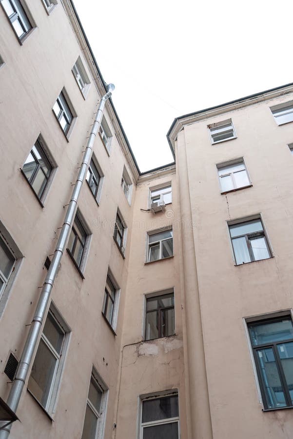 A Simple Multi-storey Residential Building on a White Isolated ...