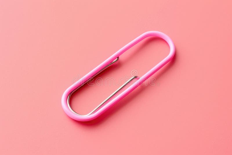 Simple Pink Paper Clip on Pink Surface. Perfect for Office or School ...
