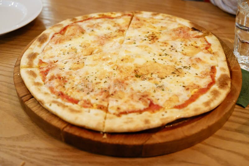 A Simple Pizza on the Table Stock Image - Image of preparation ...
