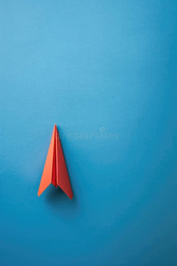 Simple Red Paper Airplane on a Vibrant Blue Background. Suitable for ...
