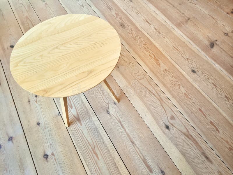 Simple Round Table on Wooden Floor Stock Image - Image of floor ...
