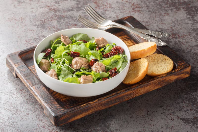 Simple Salad of Cod Liver, Fresh Arugula and Sun-dried Tomatoes Served ...