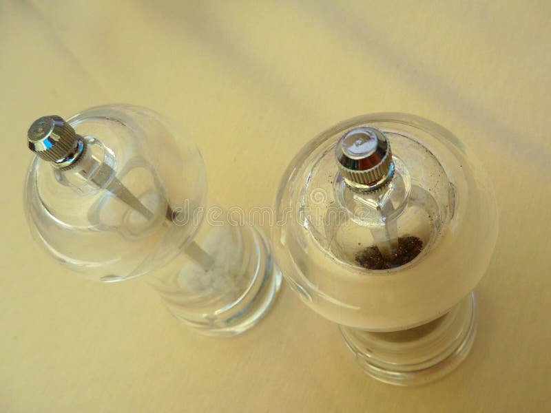 Simple Salt and Pepper Glass on a Table Stock Photo - Image of black ...
