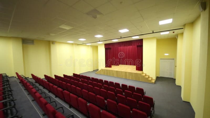 Simple and Small Auditorium with Red Armchairs and Stock Footage ...