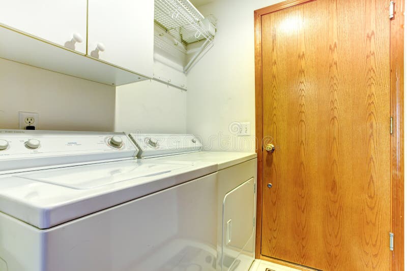 Simple small laundry area stock photo. Image of rental - 43912016