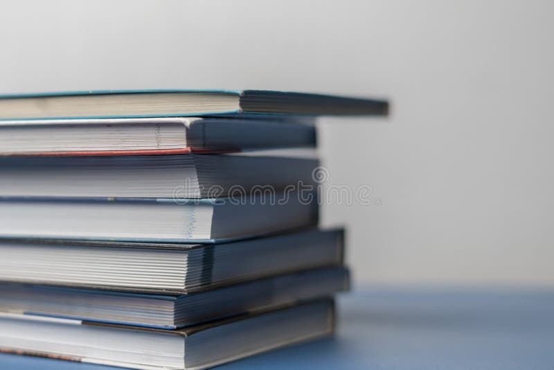 Simple Stack of Books on the Shelf at Home Stock Image - Image of ...