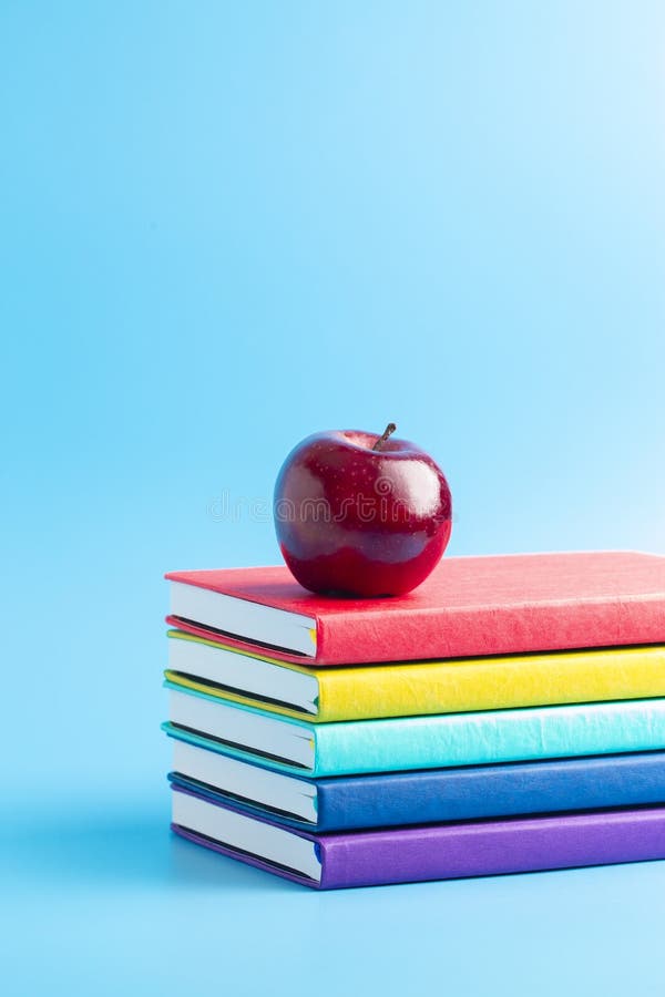 Simple Stack of Rainbow Books and an Apple a Background for Back To ...