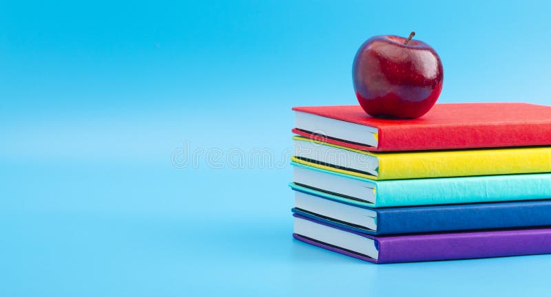Simple Stack of Rainbow Books and an Apple a Background for Back To ...
