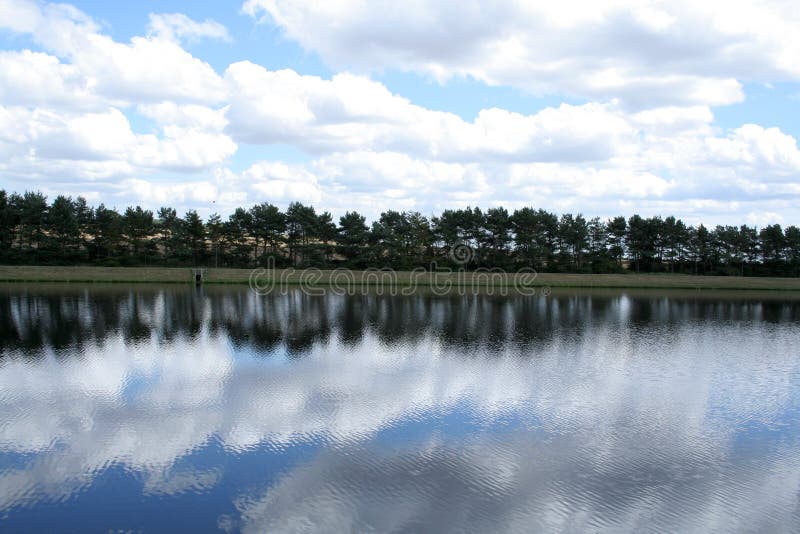 Simple Summer Reflection stock image. Image of clouds - 1020519