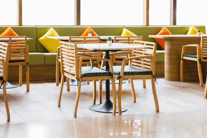 Simple Table and Chair Set in a Restaurant Stock Image - Image of light ...